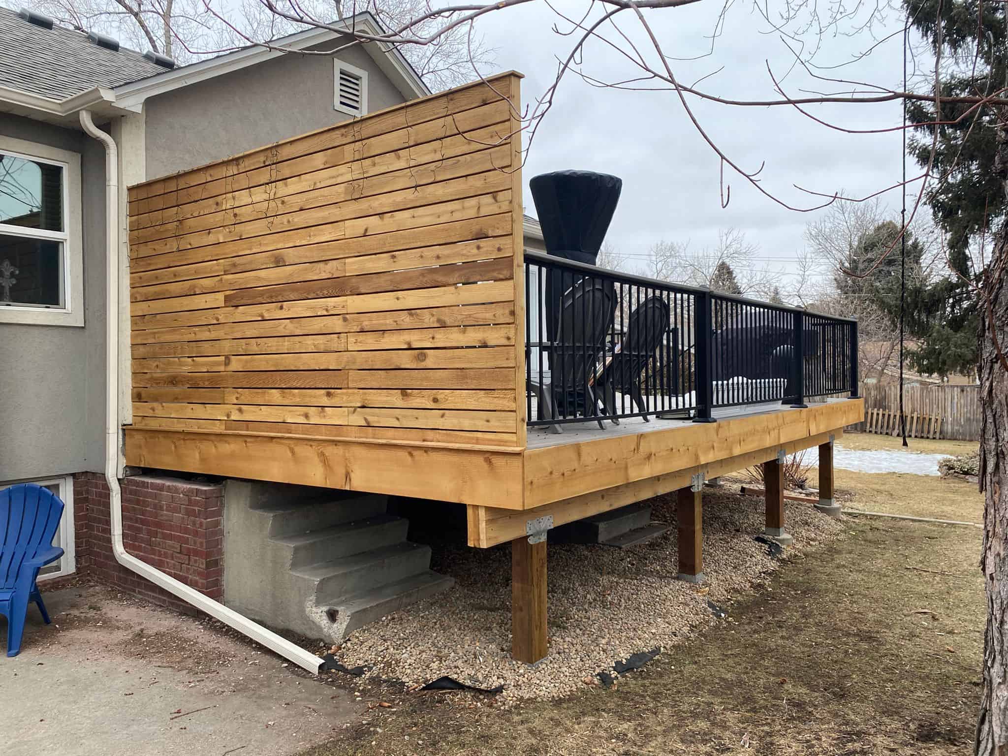 Composite deck and a custom-built bench construction in Lakewood, Co