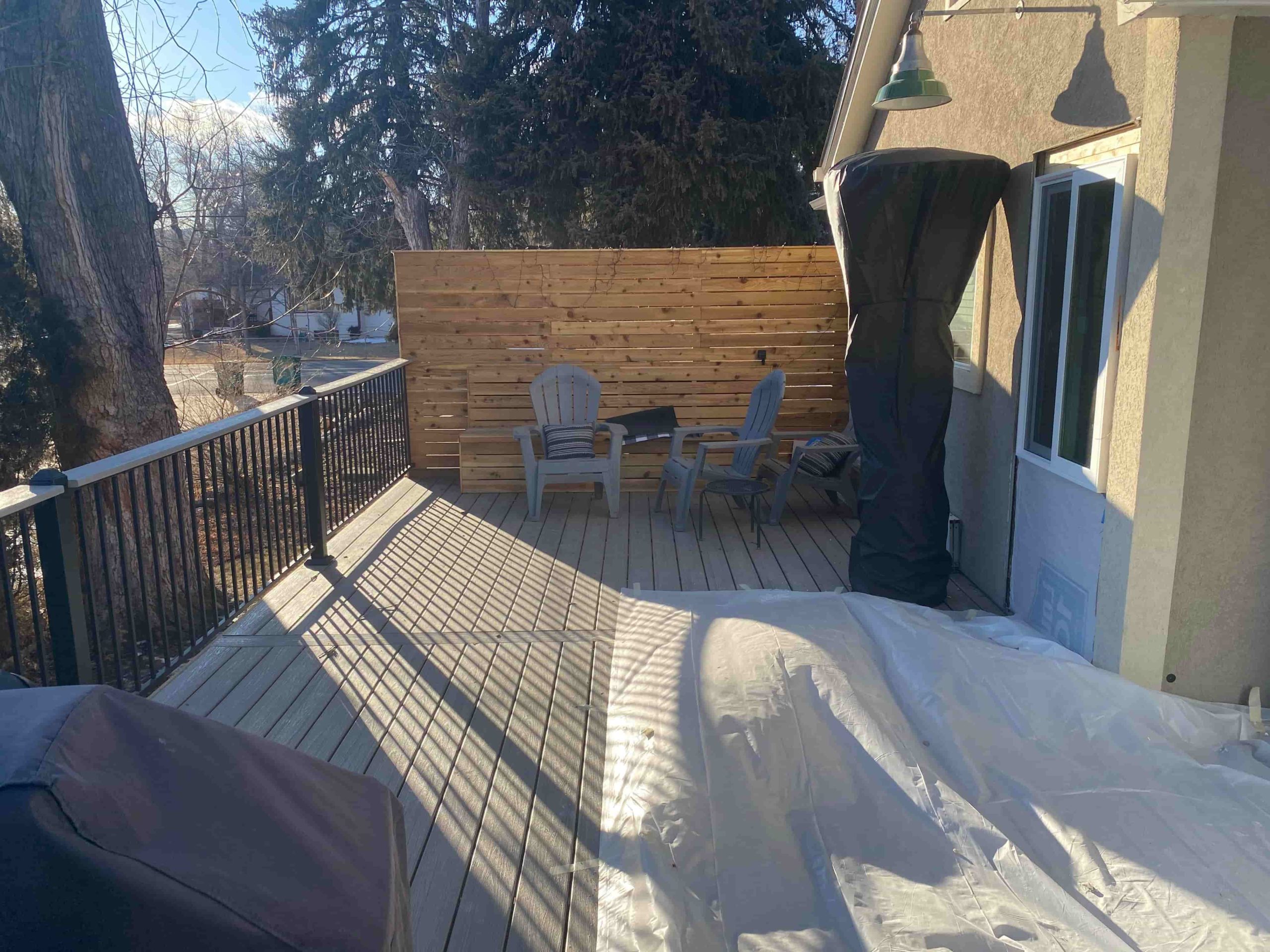 Composite deck and a custom-built bench construction in Lakewood, Co